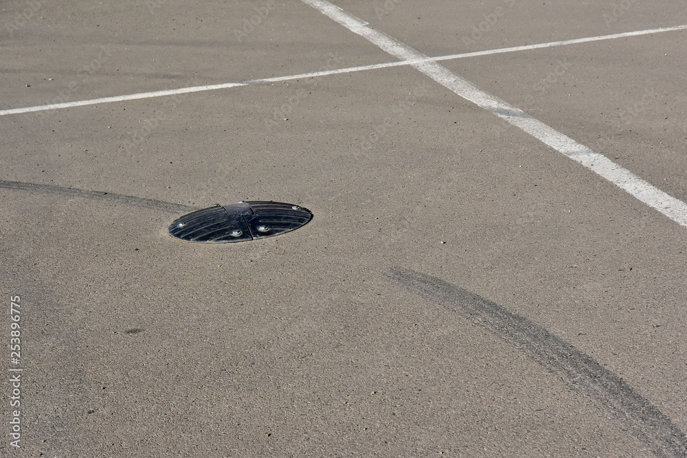 Round rubber speed bump on parking. Is set to prevent drifting on cars ...