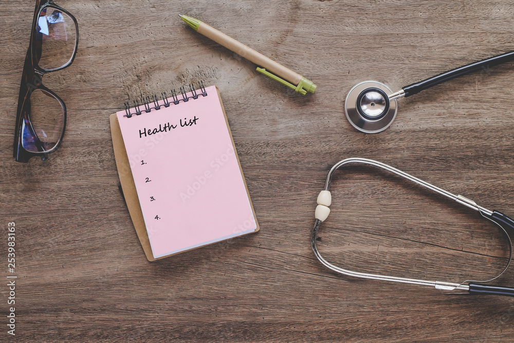 Check list for health text on book note with stethoscope on wood. Stock ...