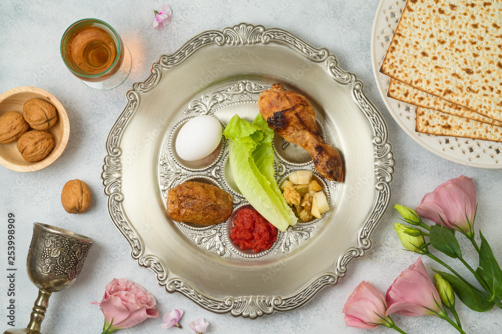 Jewish holiday Passover background with matzo, seder plate and spring ...