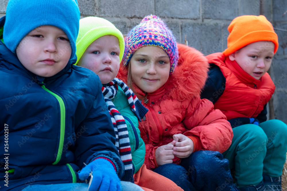 Adorable little children in colorful clothes came on an excursion ...
