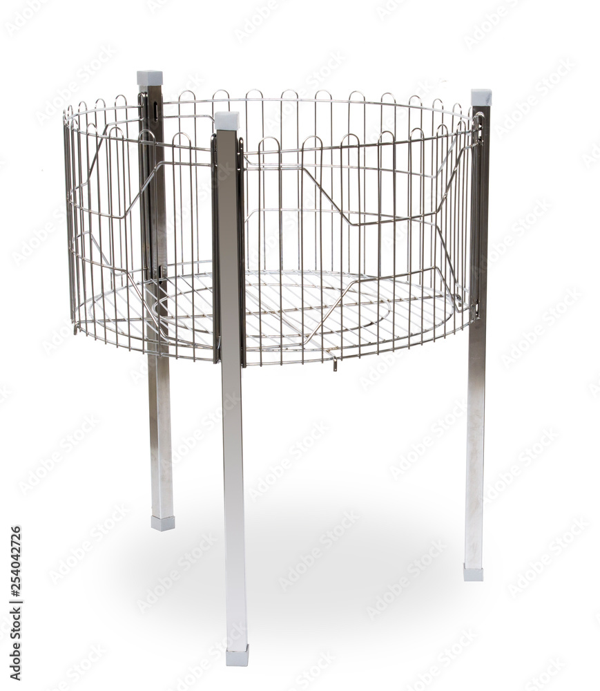 An empty three-legged steel product display stand in a shop, isolated ...