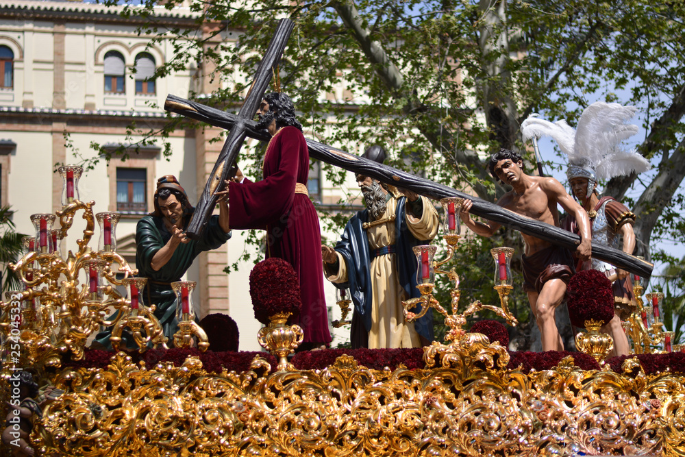 Jesus Christ with the cross towards Mount Calvary Stock Photo | Adobe Stock