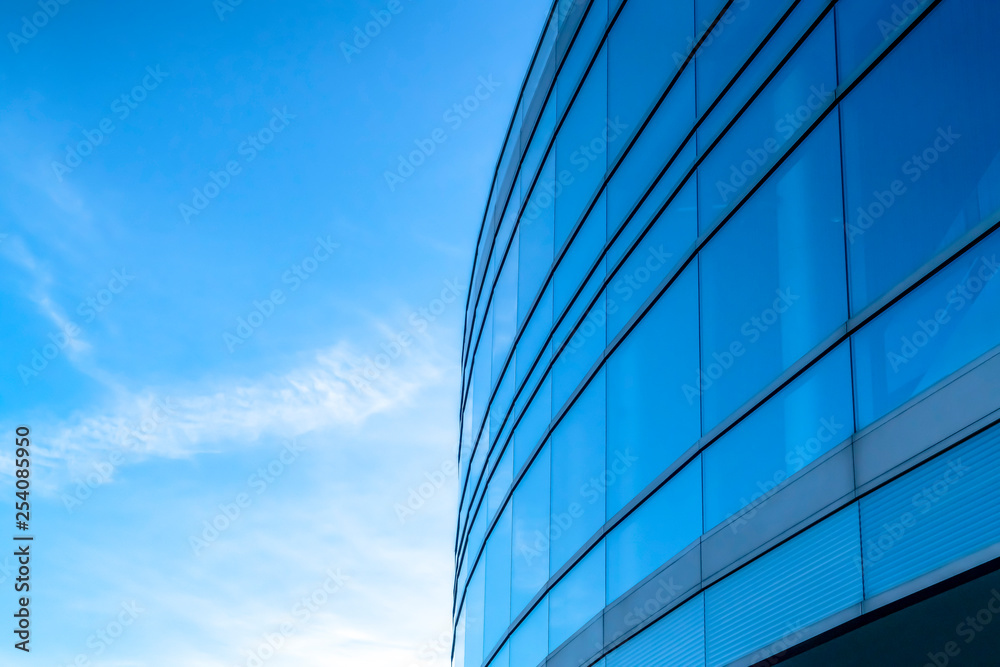 Building exterior with bright blue sky background Stock Photo | Adobe Stock