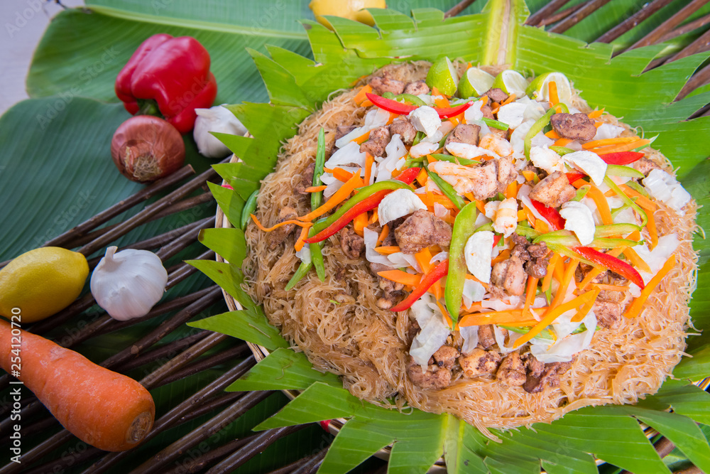 Pancit Guisado Bilao - Filipino noodles Bilao Stock Photo | Adobe Stock