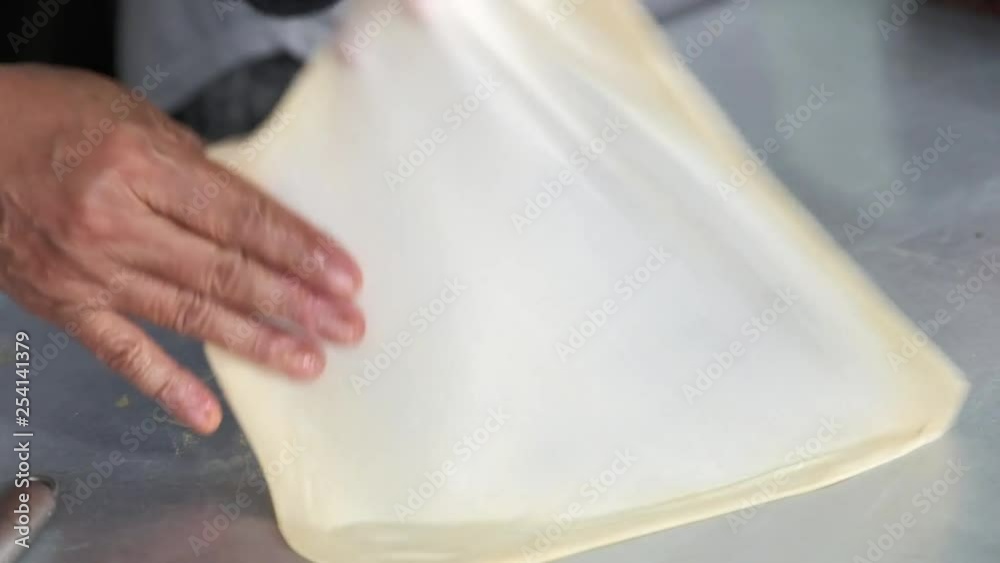 Roti fried on pan - mix egg, vegetable and chicken with roti dough ...