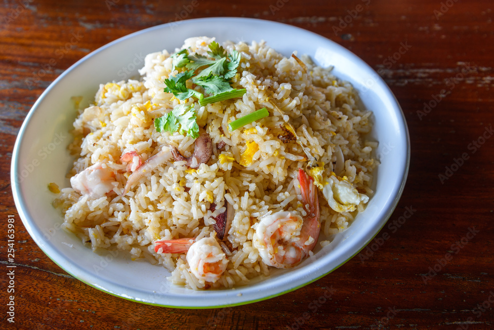 Thai asian seafood fried rice with shrimp and squid. Stock Photo ...
