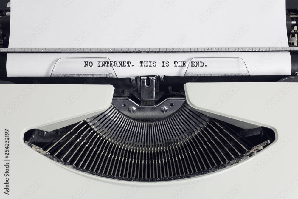 Old retro obsolete white typewriter with close-up typing text No ...