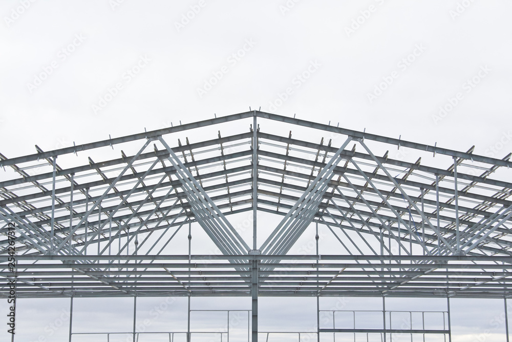 Structure of steel for building construction on sky background at the ...
