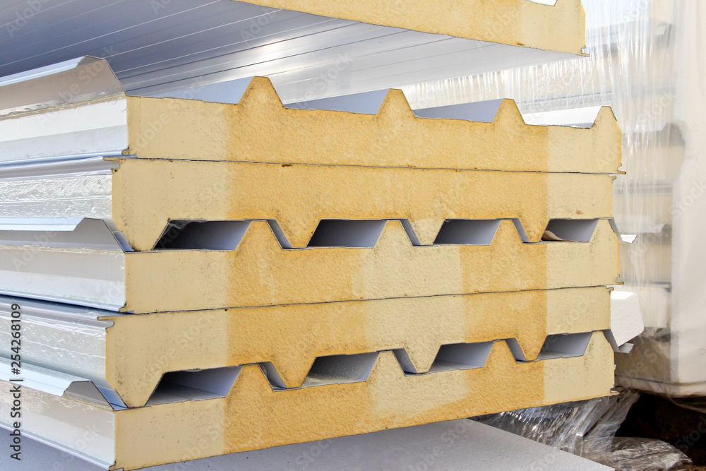Sandwich panels at the construction site. Material for warming the ...