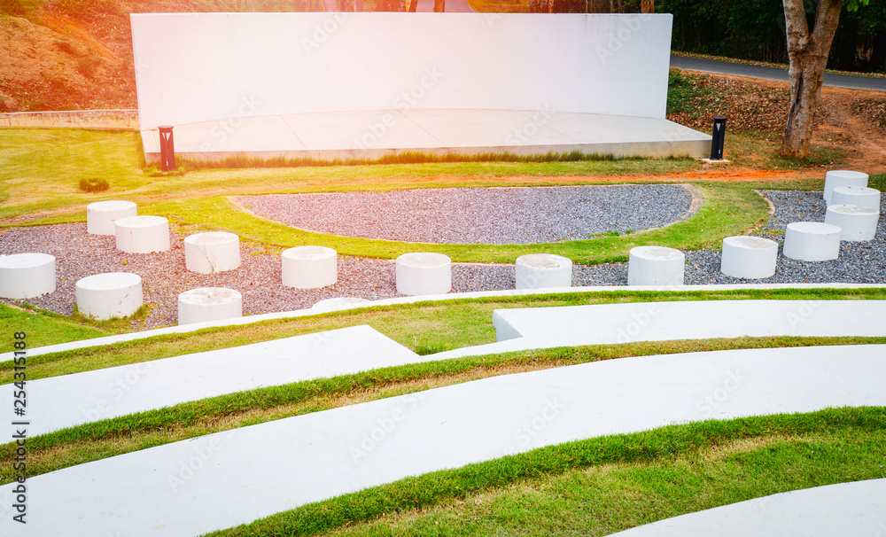 Stage outdoors / stage show with Park bench Cement and pathway in the ...