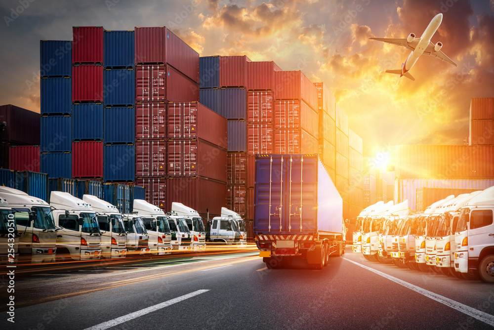 Container truck in ship port for business Logistics and transportation ...