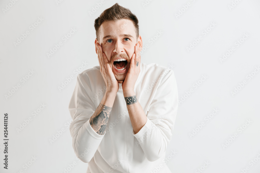 Screaming, hate, rage. Crying emotional angry man screaming on gray ...