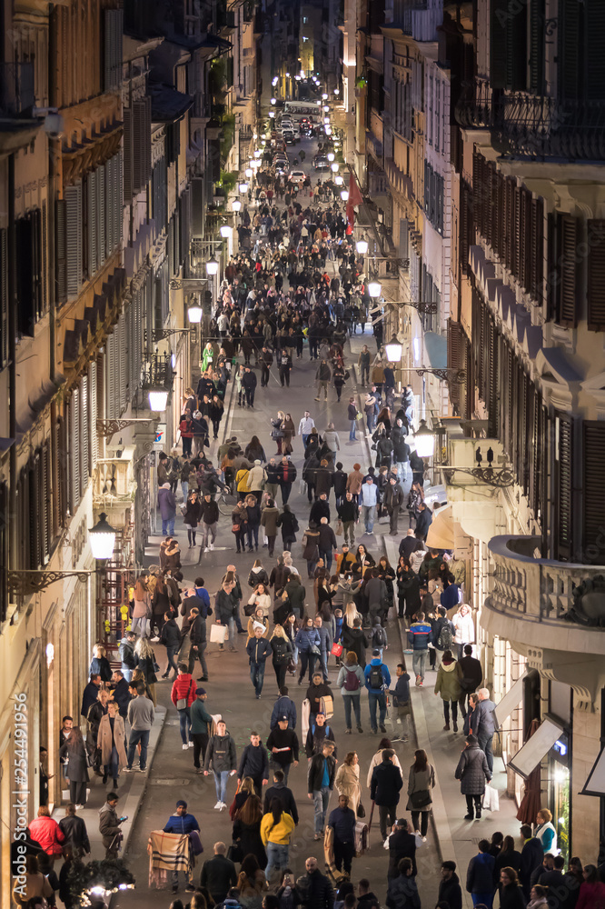 Crowd in Via Condotti in Rome, Italy. The street of the windows of ...