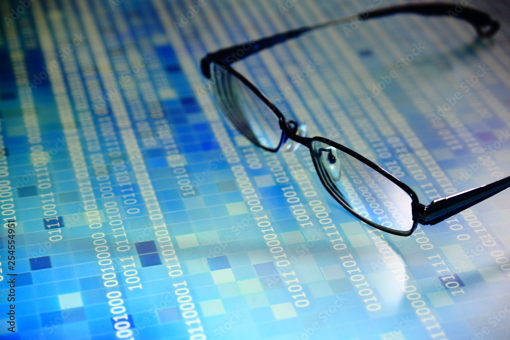 big data analysis. blue binary code on led panel with black background ...