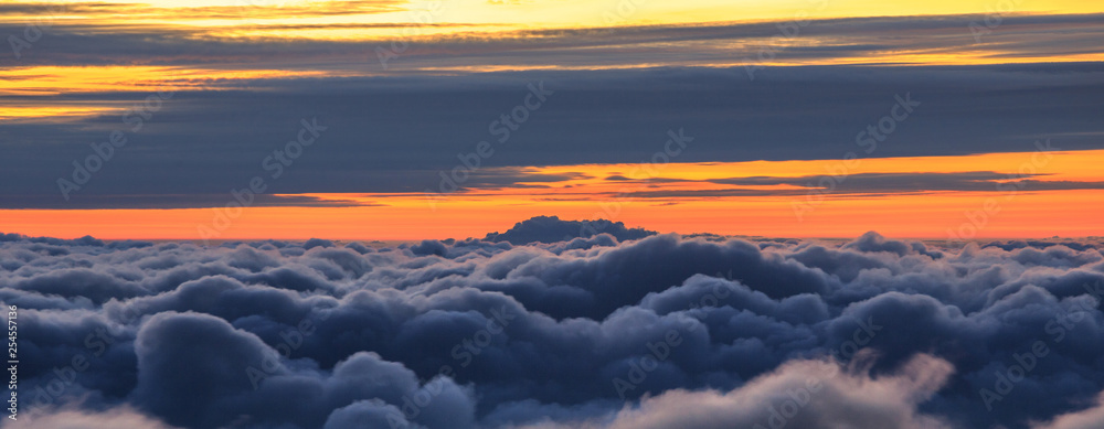 Abstract photograph above the clouds, sea of clouds effect, flying ...