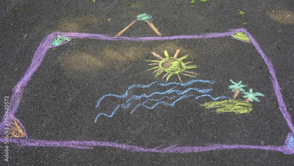 Young kid chalk drawing of sea water, tropical island with palms and ...