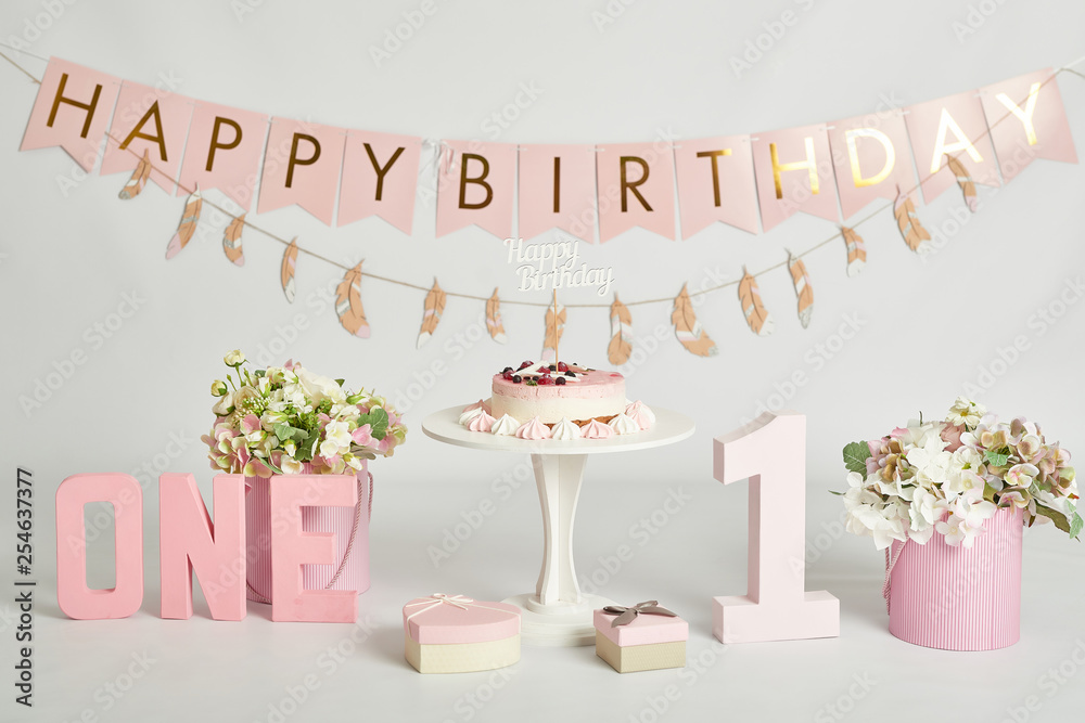 pink decoration for the first year photo session cake smash Stock Photo ...