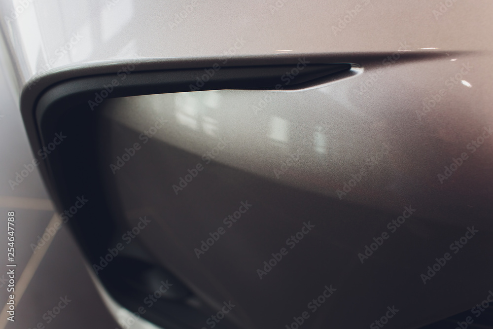 Grid of car with sunflare. Radiator grille. Metal close-up texture ...
