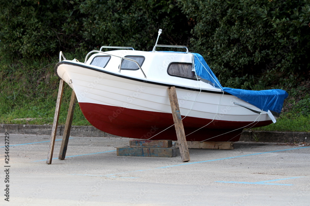 Completely restored small boat taken out of water during winter on ...