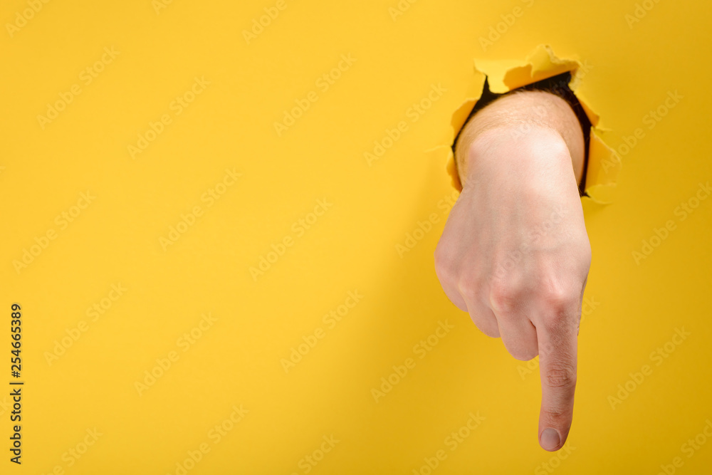 Finger pointing down Stock Photo | Adobe Stock