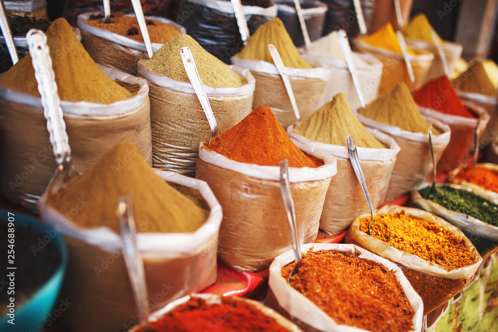 Indian colored spices at local market. A variety of spices of different ...
