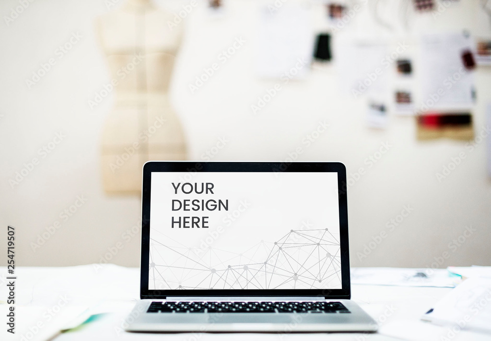 Laptop in a Design Studio Mockup Stock Template | Adobe Stock