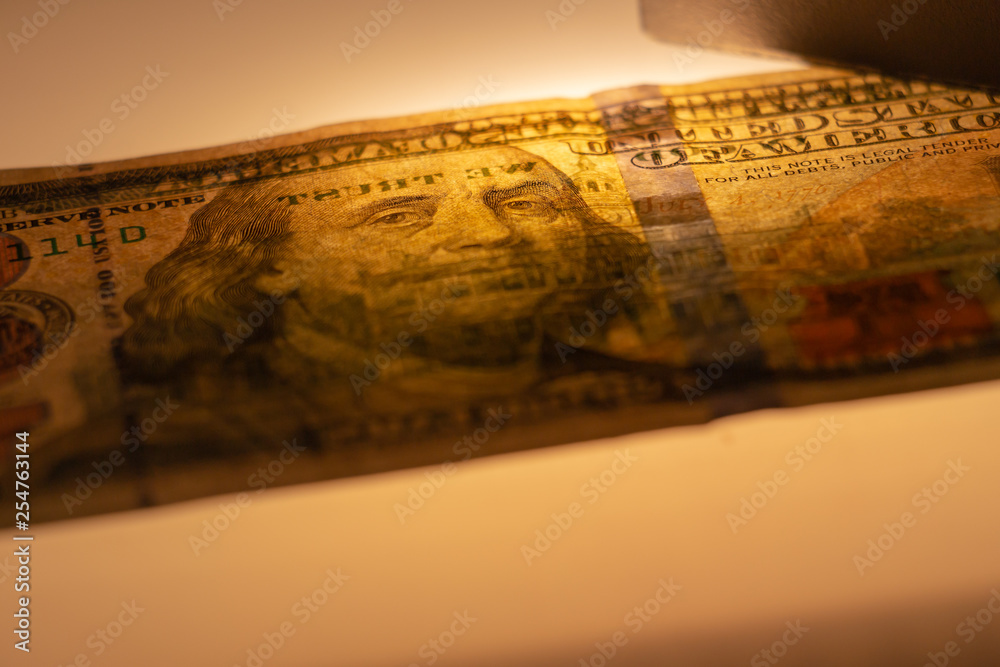Verifying the authenticity of the hundred dollar bill in penetrating ...