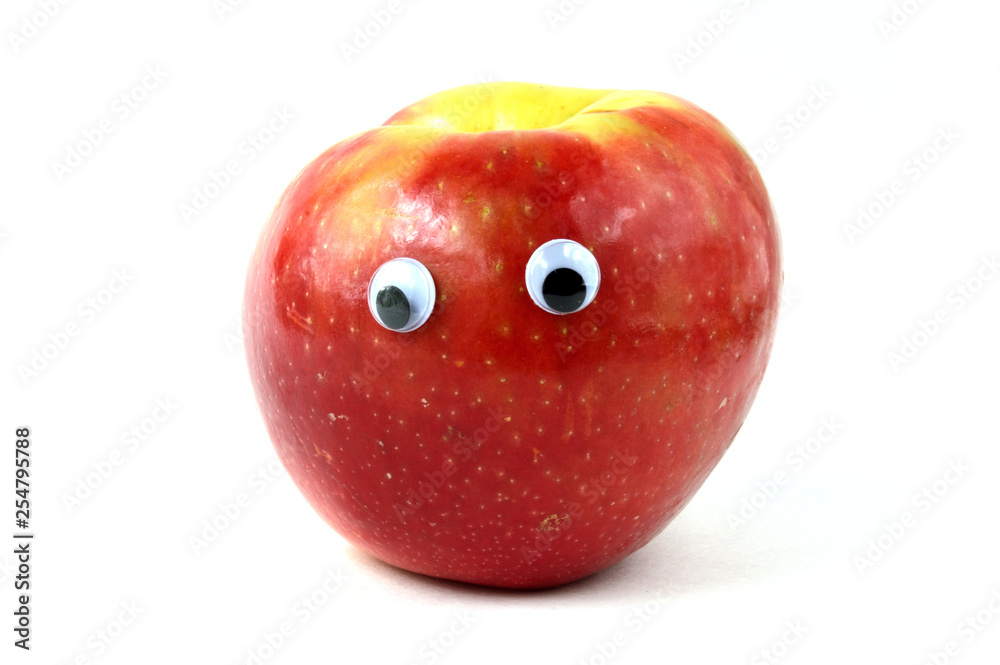 Forward facing apple with googly eyes on a white background Stock Photo ...