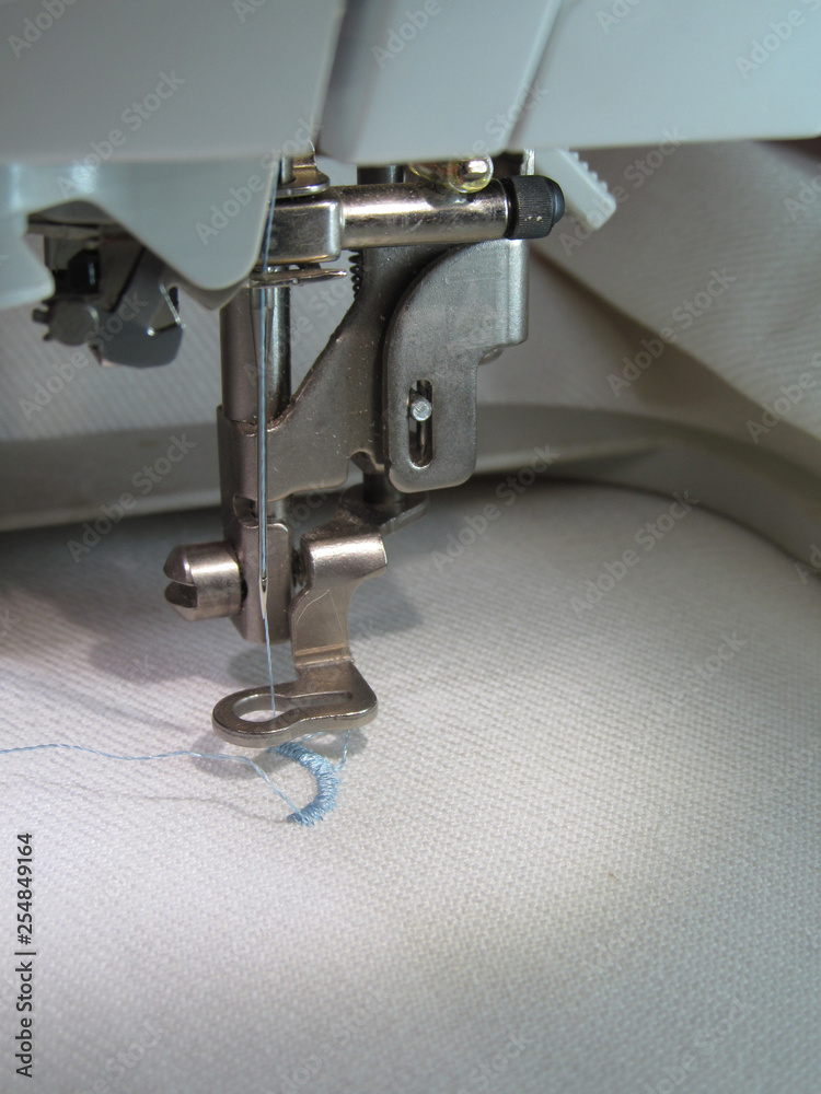 Mechanism with a needle of the computer embroidery machine, close-up ...