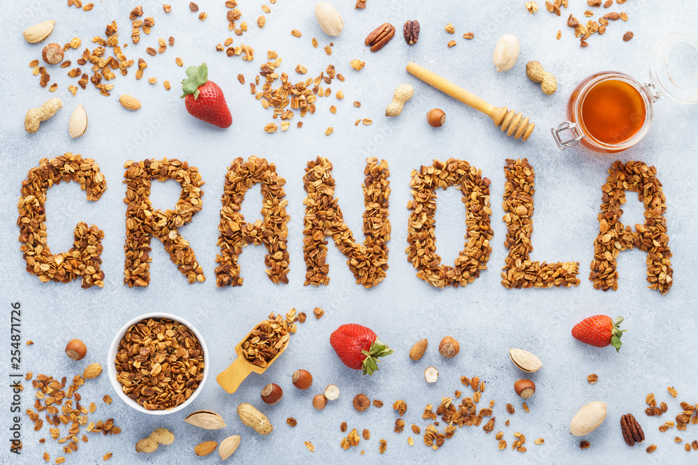 Foto de Word granola made of baked oats granola. Background. do Stock ...