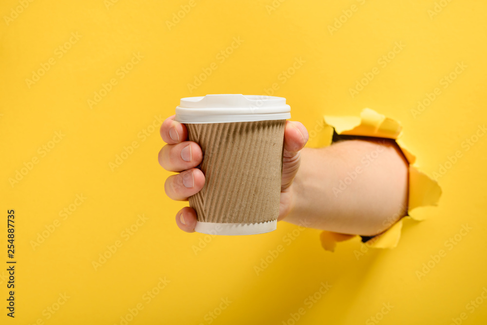 Hand taking a cup Stock Photo | Adobe Stock