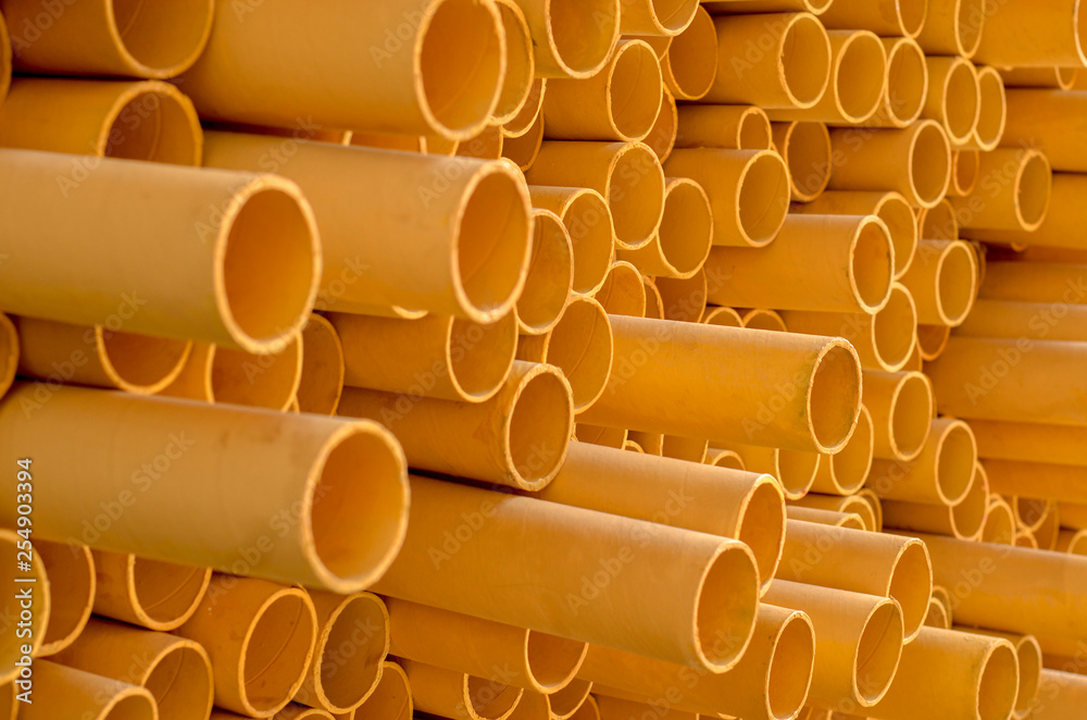 Side view of abstract art structure created by stacking yellow pvc ...