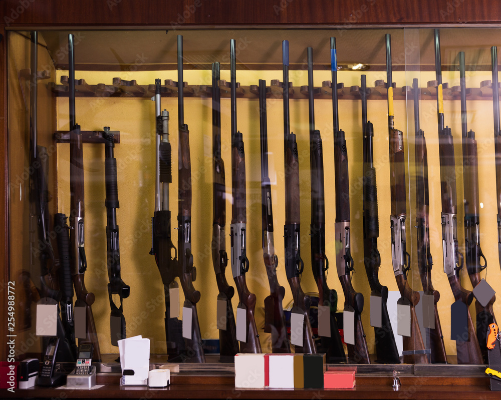 Gun shop interior with specialized rifles Stock Photo | Adobe Stock