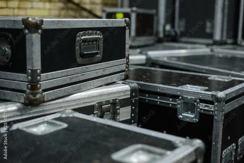 Stage equipment behind the scenes. Concert activity. Cases for ...