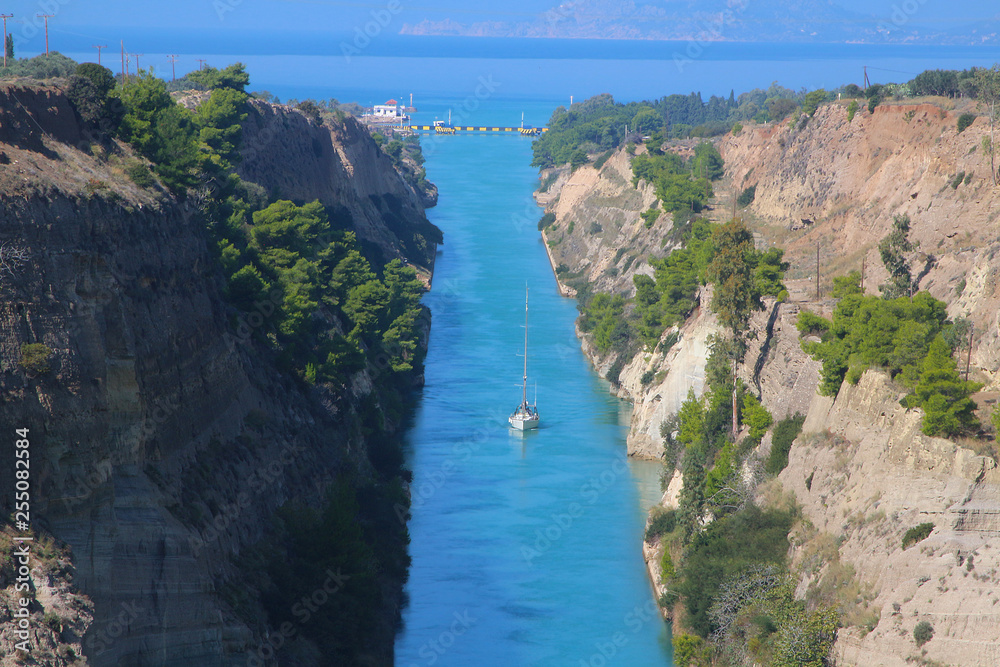 Photo & Art Print Sailing boat crossing the Corinth canal, which ...