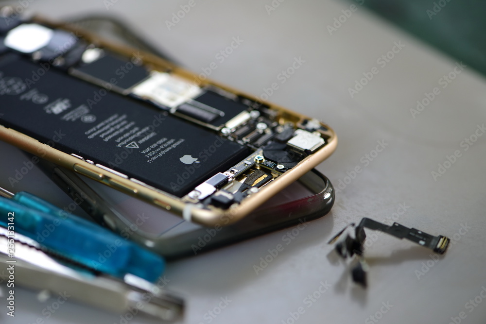 technician repairing broken mobile phone close-up.Close-up Of A Human ...