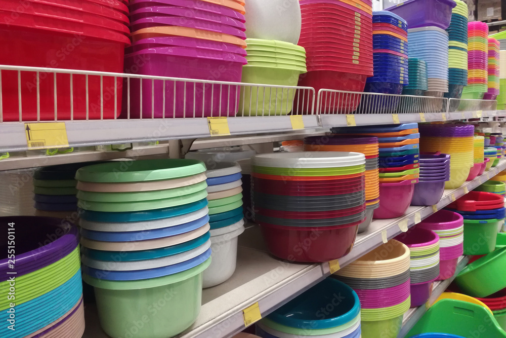 Containers made of plastics, many colors and sizes are placed in the ...