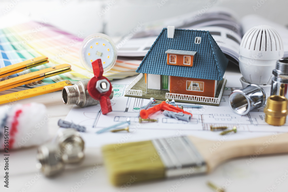 house building and repair concept - construction and design items on ...