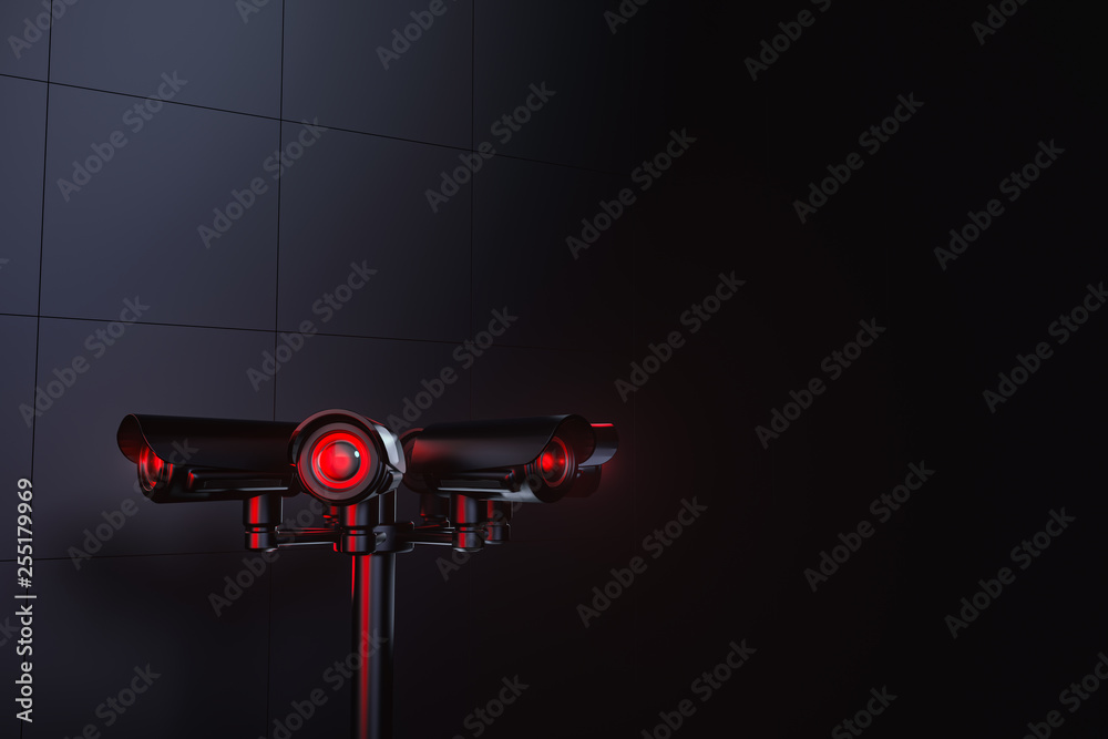 Pylon with several cctv cameras and copy space above. Future with ...