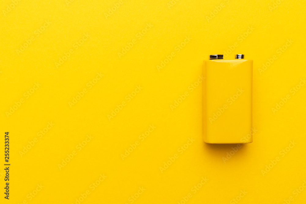 blank nine-volt battery on the yellow background with copy space Stock ...