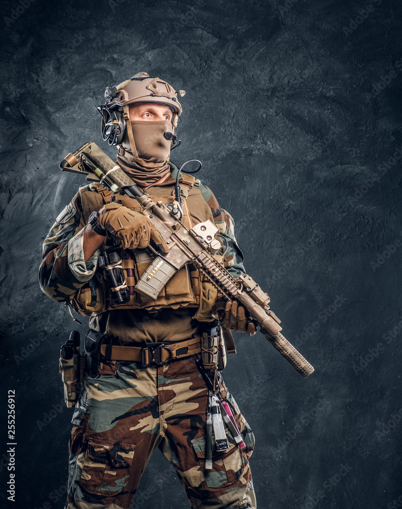 Elite unit, special forces soldier in camouflage uniform posing with ...