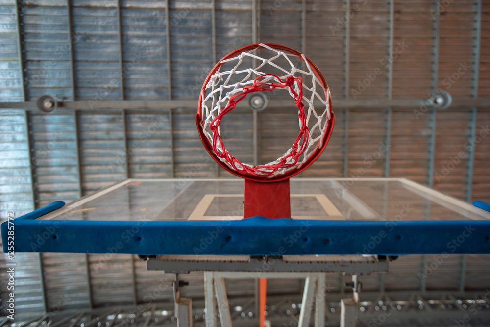An interior space of a basket ball court showing a scaffolding metal ...