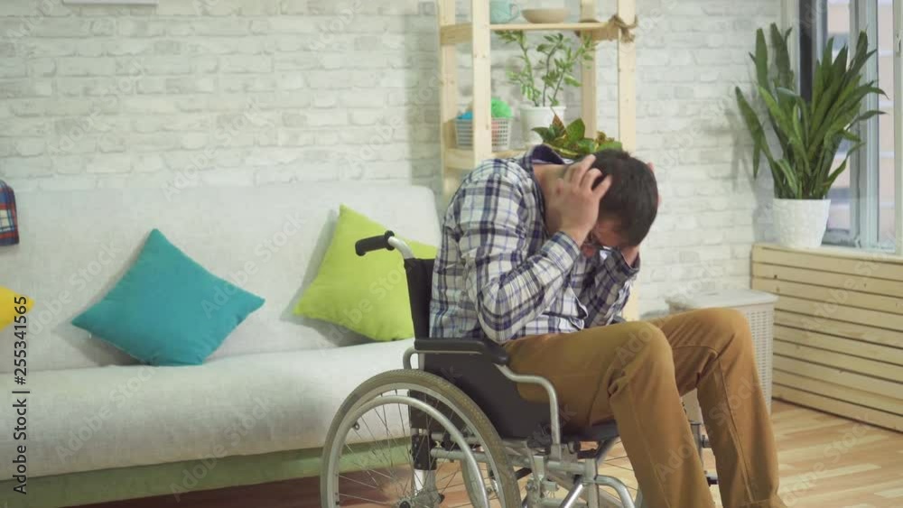 adult male disabled person wheelchair autistic panic fit home Stock ビデオ ...