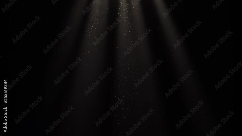 Dust particles floating in the air.light on black curtain with dust ...