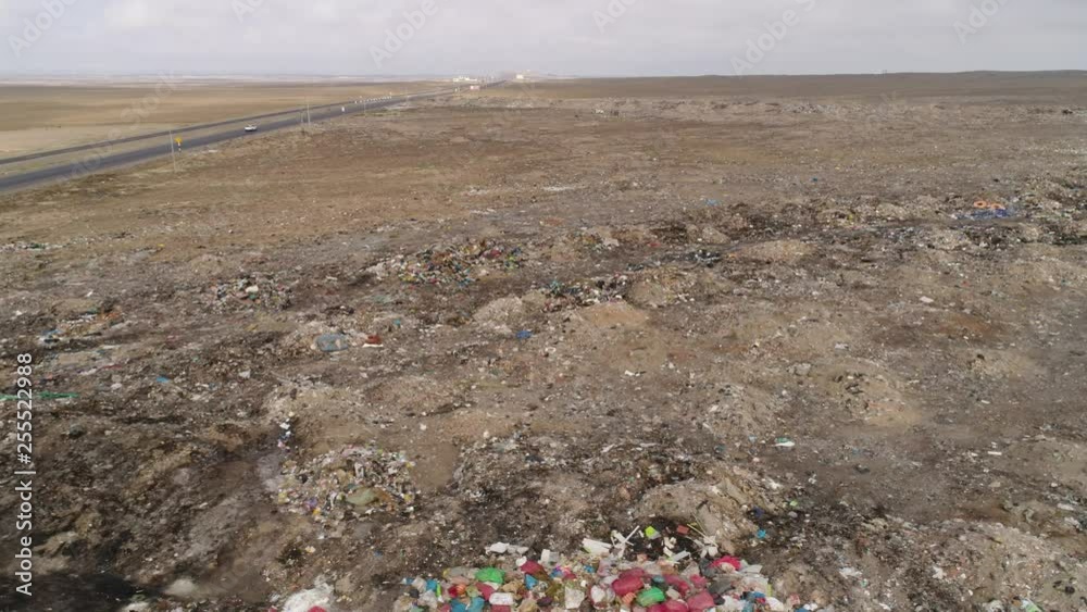 Environmental Pollution: Desert with a garbage dump. Aerial. Peru ...