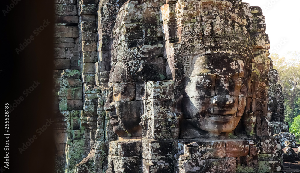 Smiling Faces of Bayon temple in Angkor Thom ancient ruin near Angkor ...