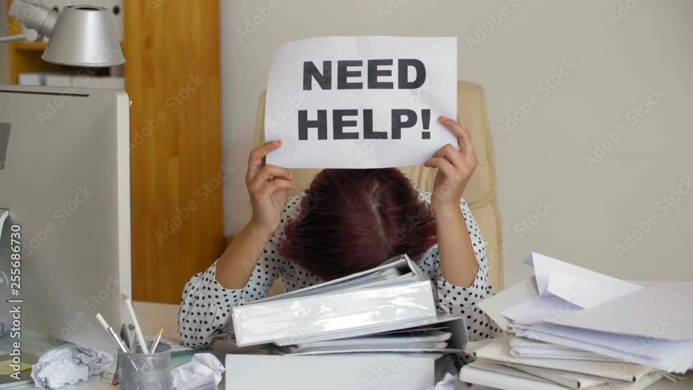 Lockdown of female Indian office worker sitting at desktop, putting her ...