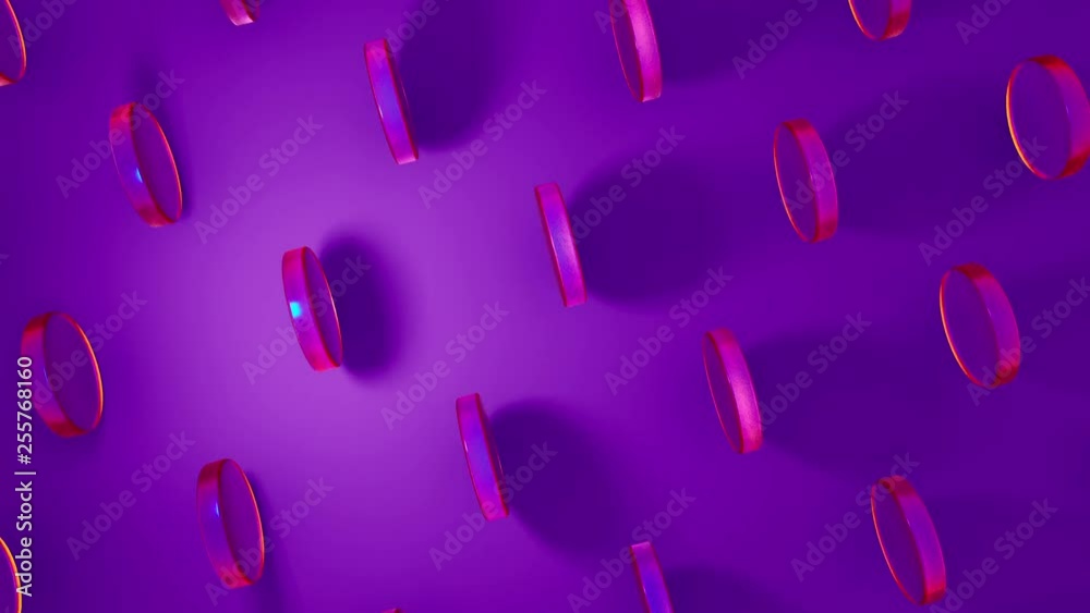 3D computer rendering of crystal glass round objects rotating on purple ...