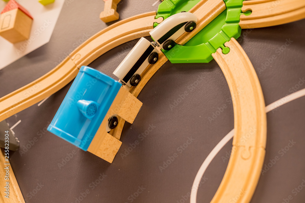 Toy Train in brick town.wooden trains in indoor playground or amusement ...