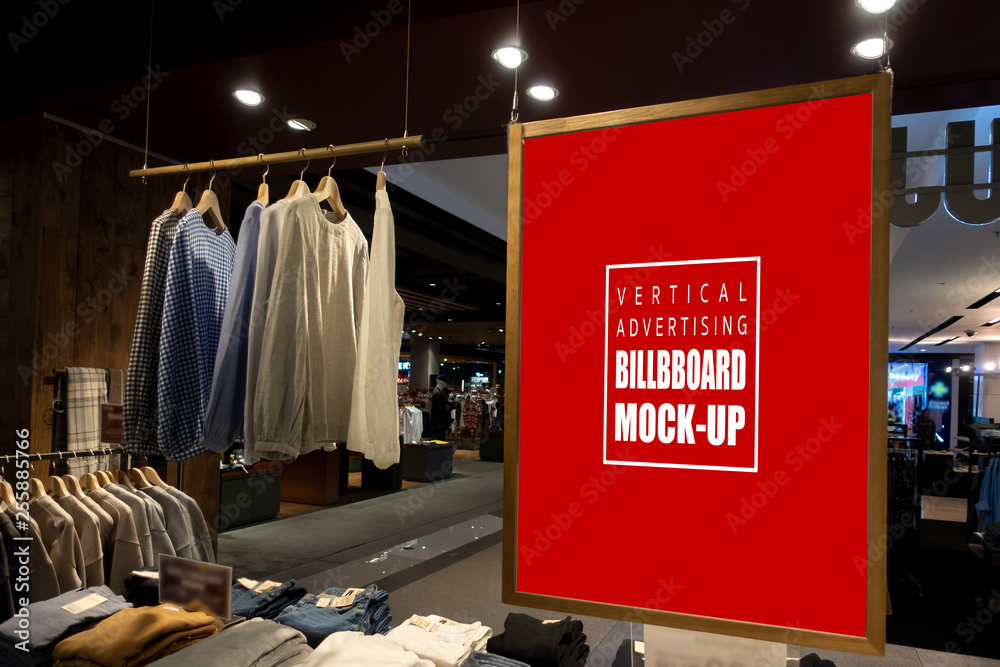 Mock up vertical billboard hanging in clothes shop for men Stock Photo ...